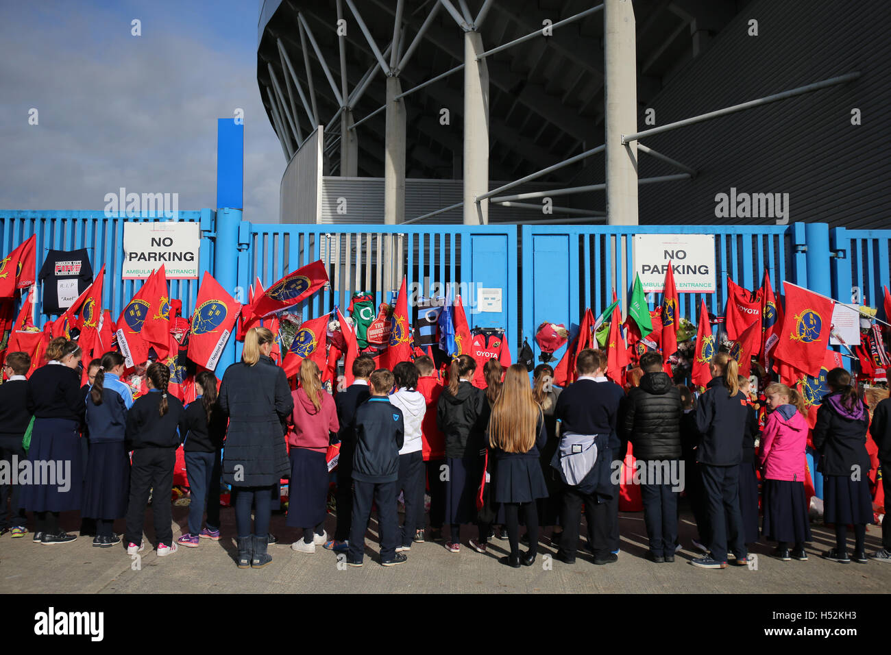 School children look at tributes to Munster Rugby Coach Anthony Foley ...