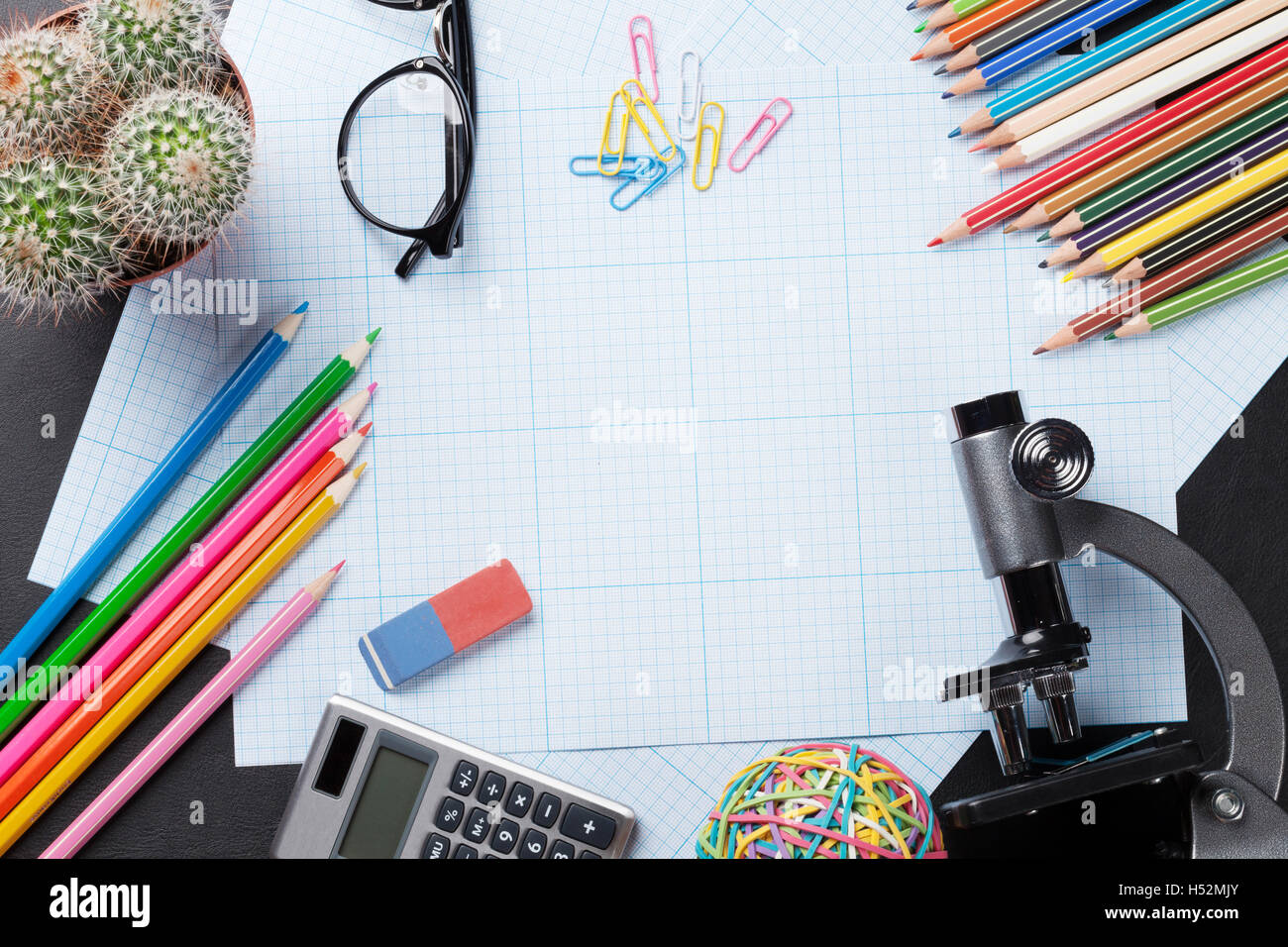 School and office supplies in front paper. Back to school concept with ...