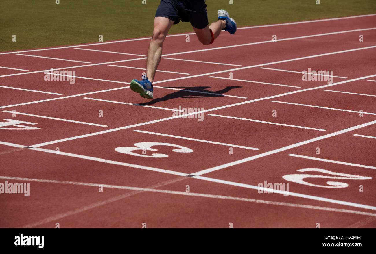 Detail of a male athlete crossing the finish line. Horizontal Stock ...
