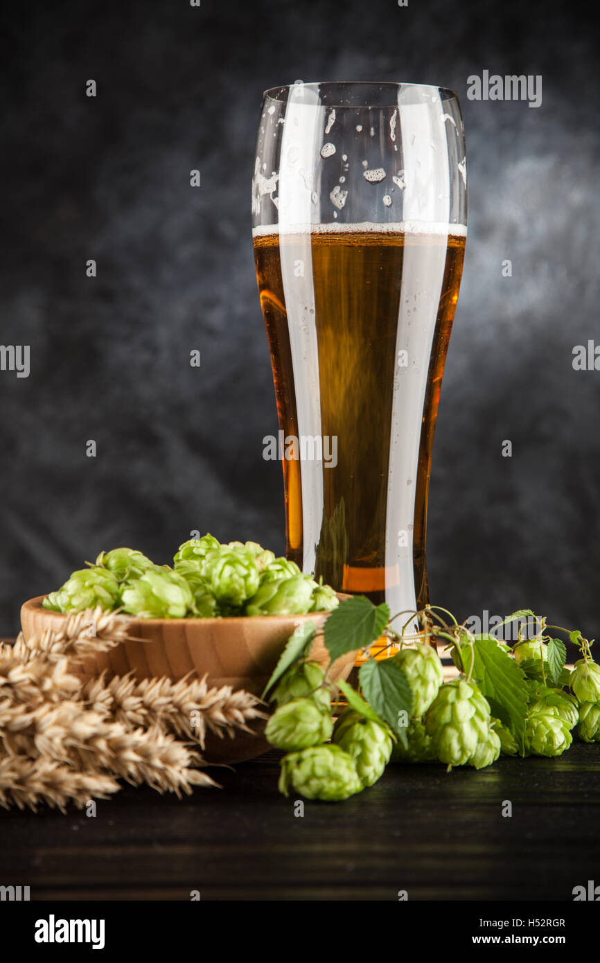 Beer glass on dark background Stock Photo - Alamy