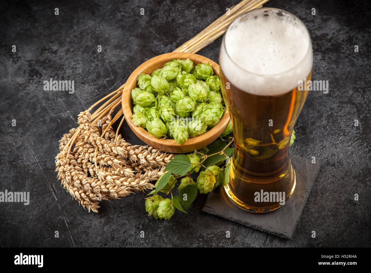 Beer glass on dark background Stock Photo - Alamy