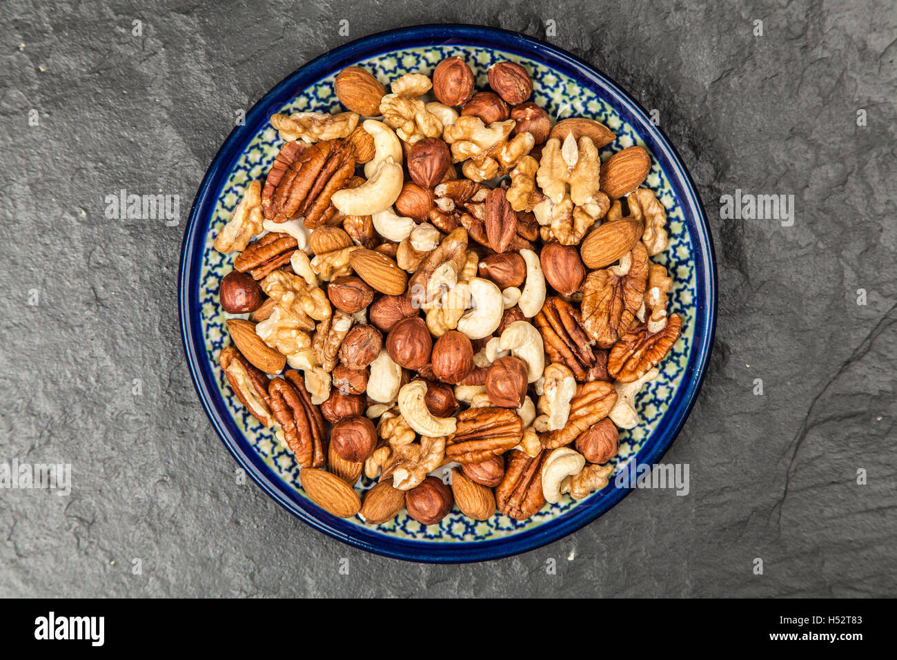 Mix of different nuts closeup photo Stock Photo - Alamy