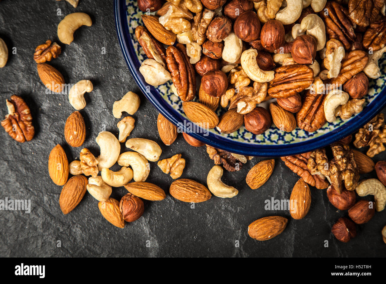 Mix of different nuts closeup photo Stock Photo - Alamy