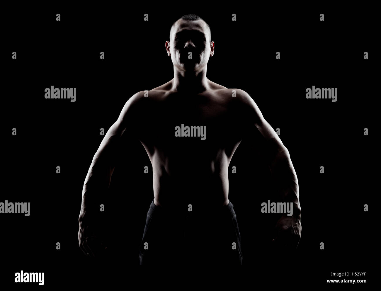 Silhouette of a strong man Stock Photo - Alamy