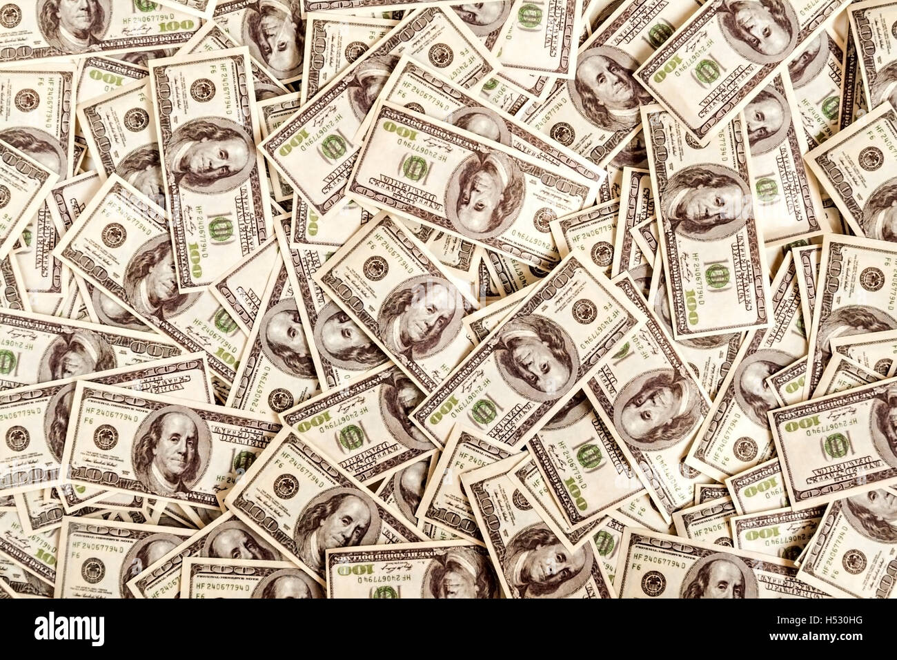many 100 dollars background Stock Photo - Alamy
