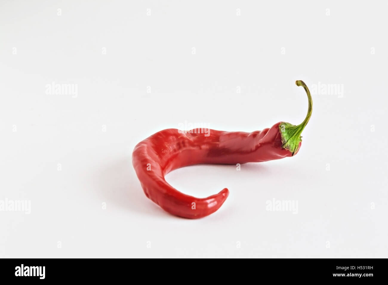 One pod of red chili peppers isolated Stock Photo - Alamy
