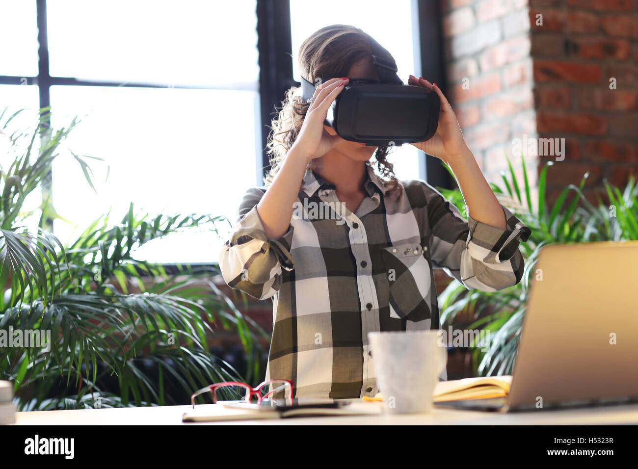 Woman with VR headset Stock Photo - Alamy