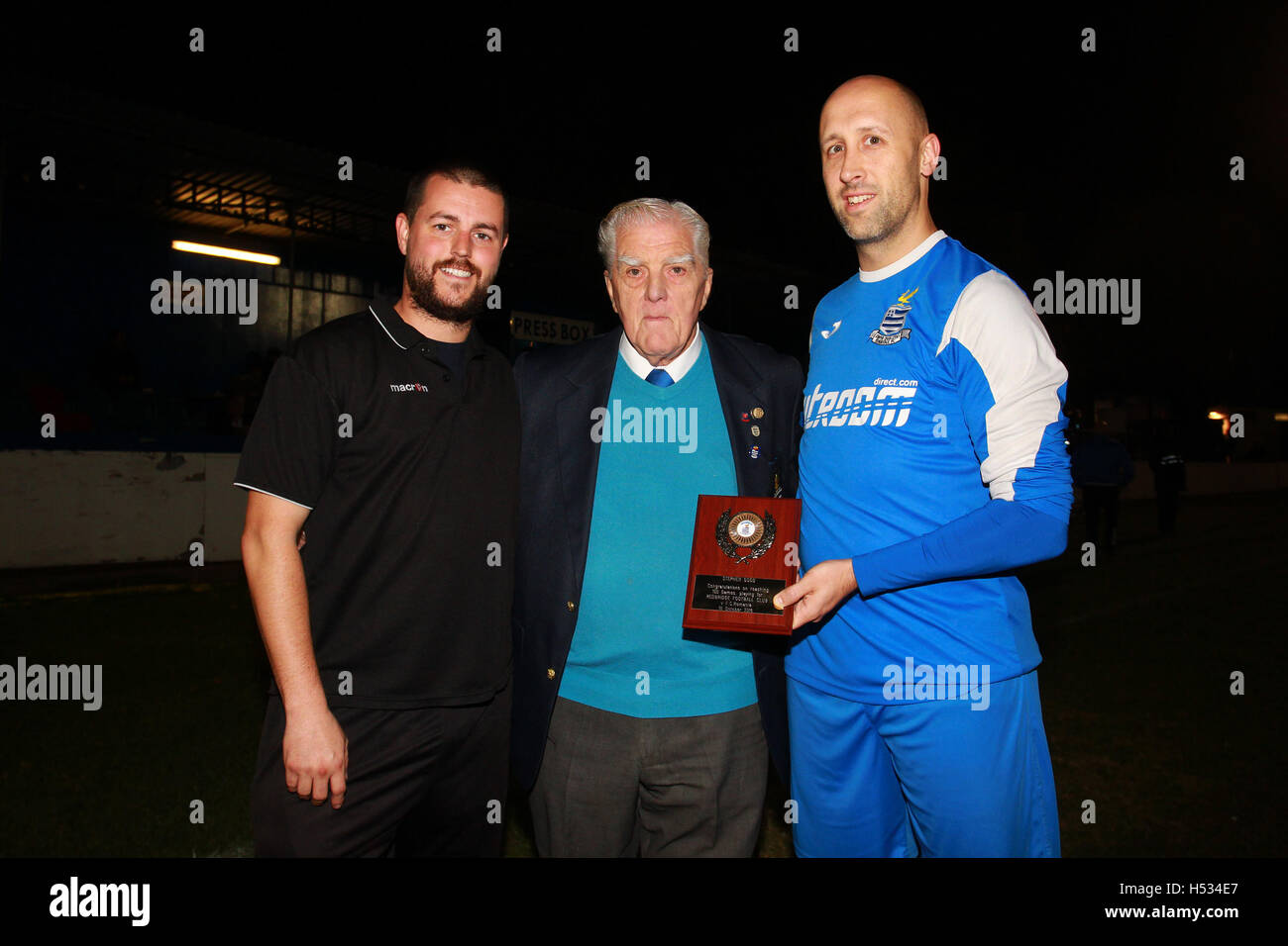 Stephen Good of Redbridge (R) receives a presentation to mark his 100th ...