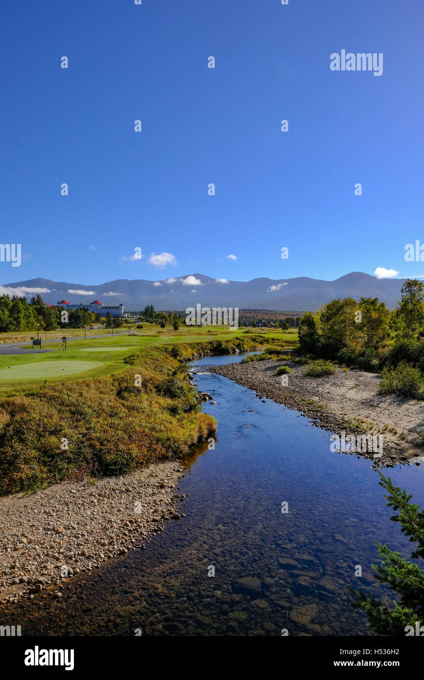 Landscape view of of a freshwater salmon stream with a mountain range ...