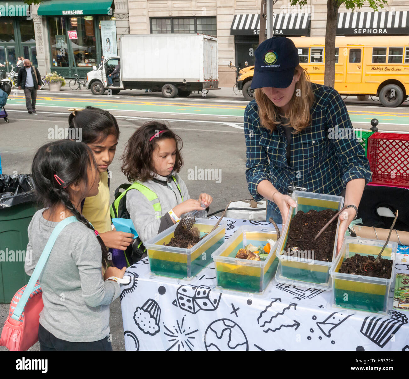 A worker from GrowNYC explains the intricacies of composting at the ...