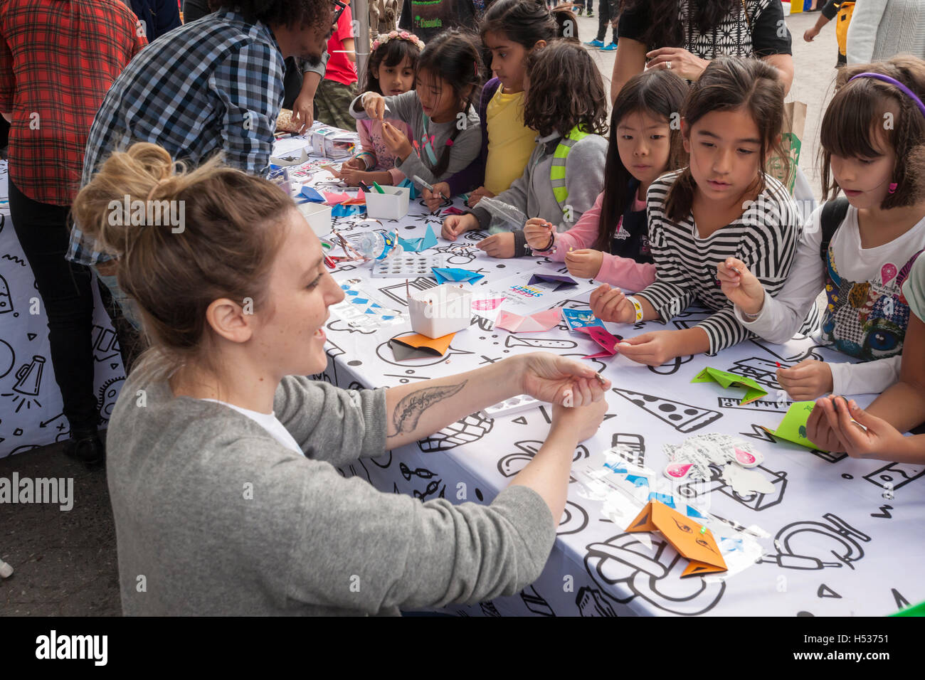 A worker from Blink Blink explains the company's DIY circuitry tools to ...