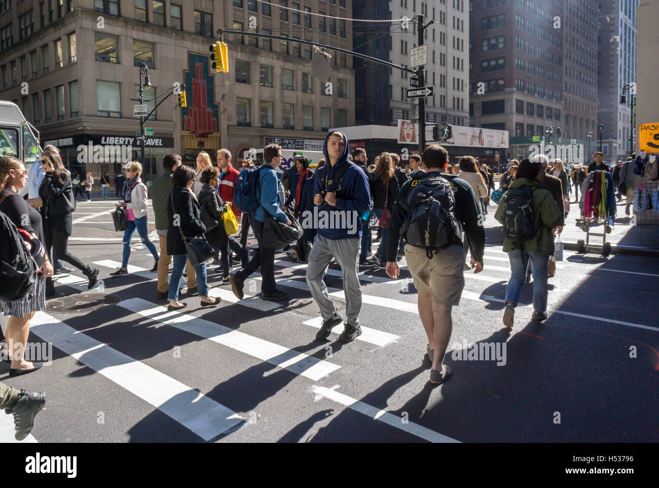 Visitors and workers in the Garment District in New York at an ...