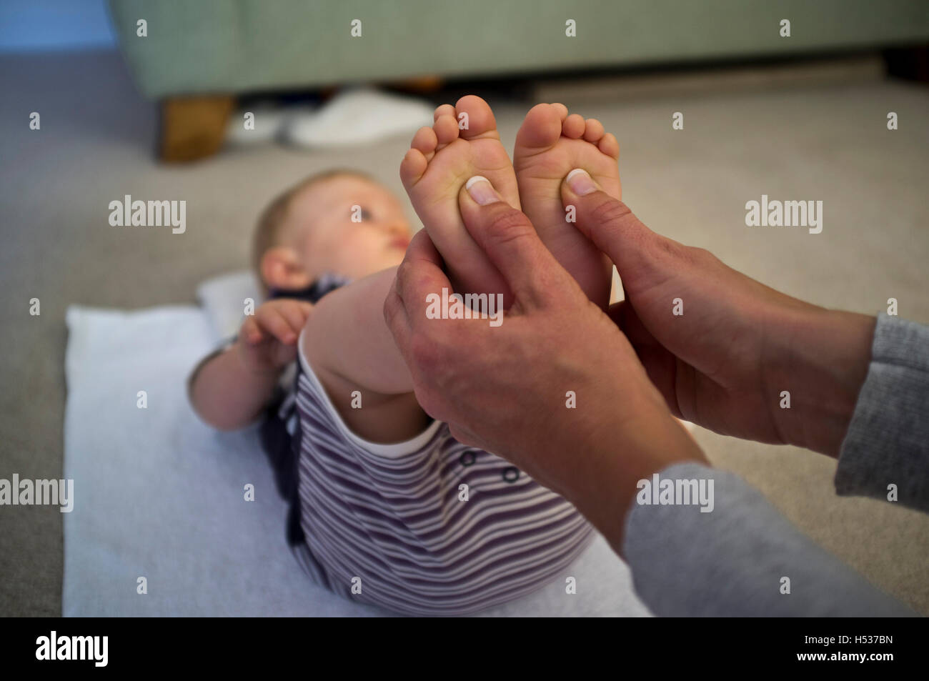 dh Reflexology HEALTH UK Baby infant bare feet reflexology child ...
