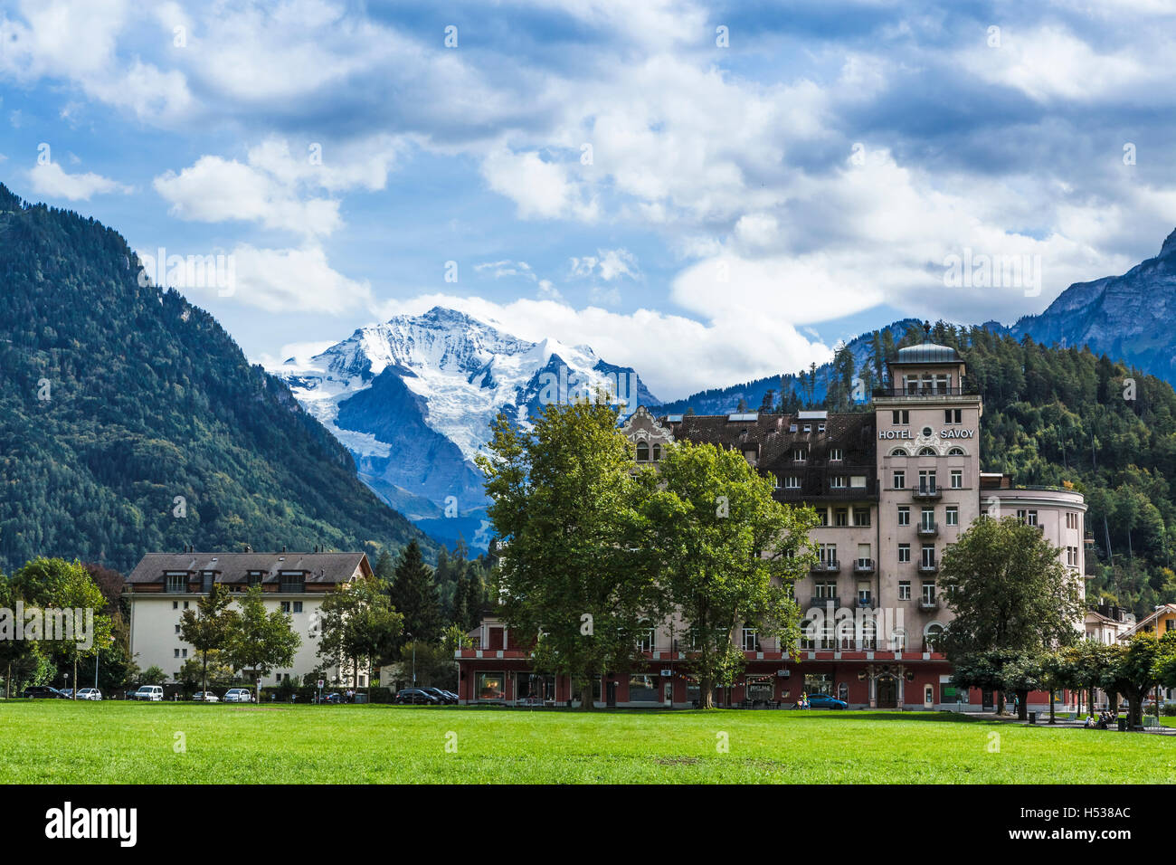 Park in Central Interlaken with mountain peak view of Jungfrau in the ...