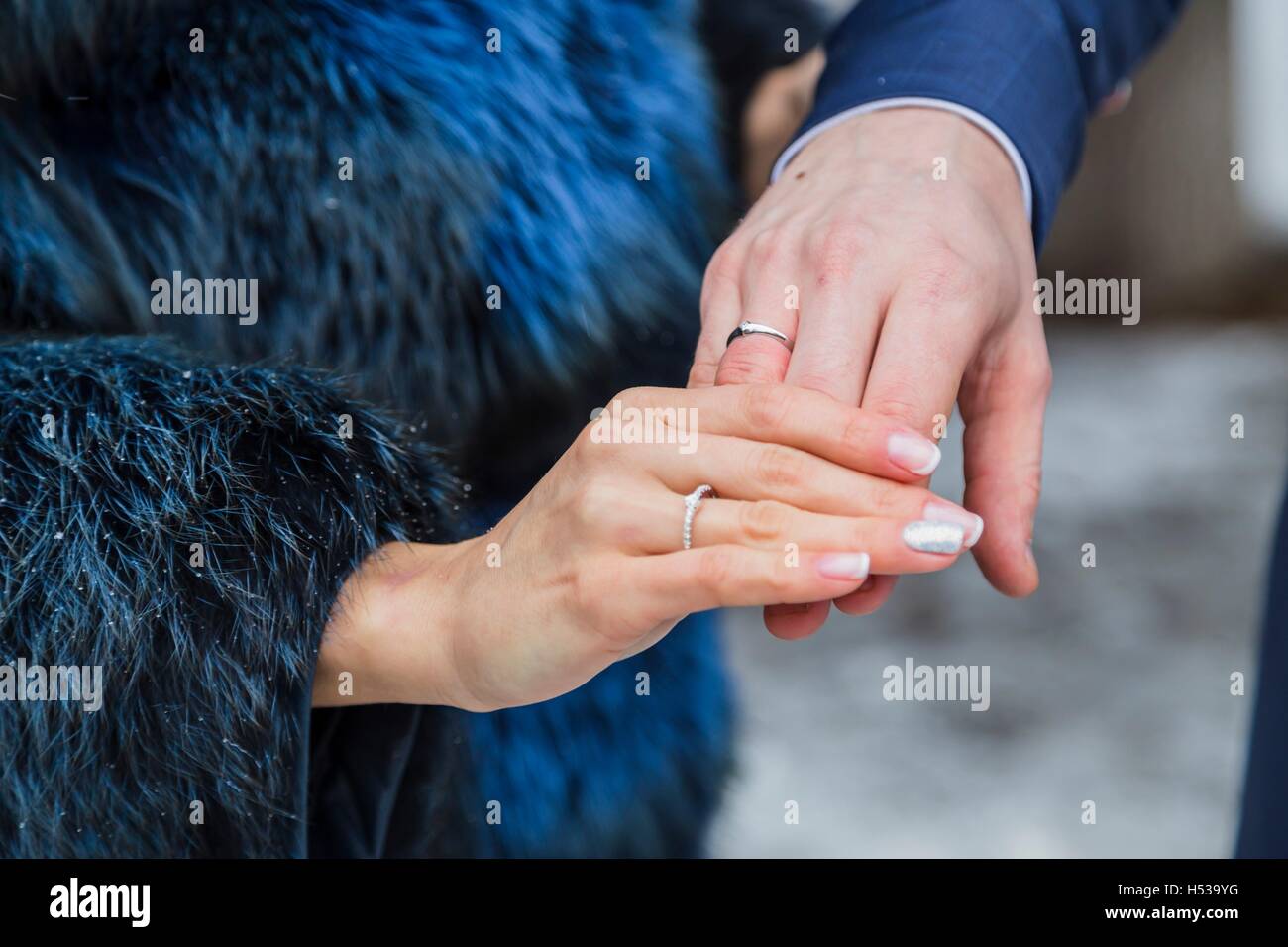 Man and woman hands with wedding ring Stock Photo - Alamy