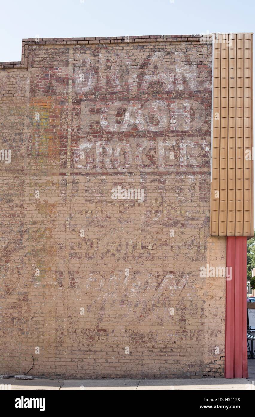 A fading advertisement on the side o a brick building in historic Van ...