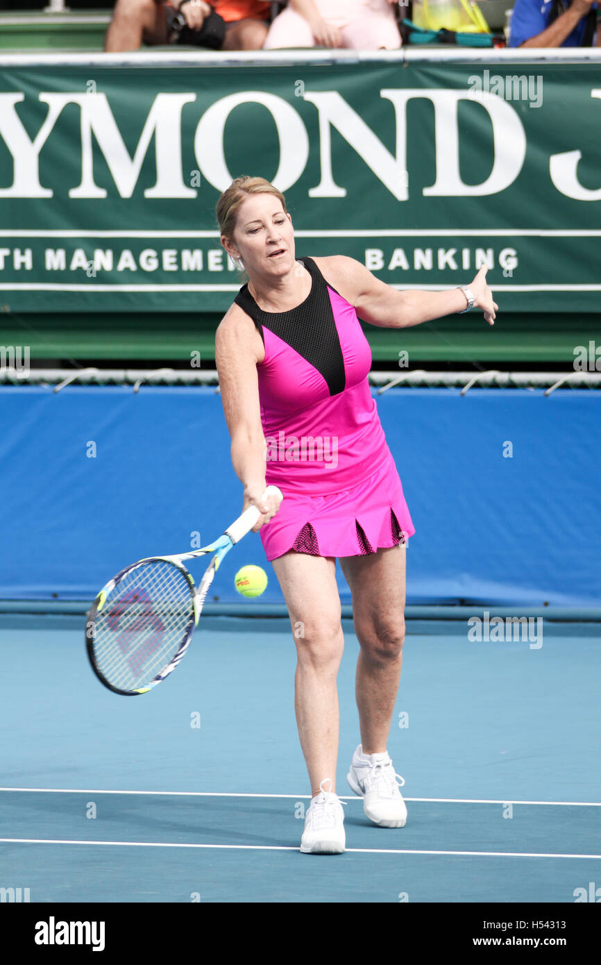 Chris Evert returns a forehand shot during her match on November 22 ...