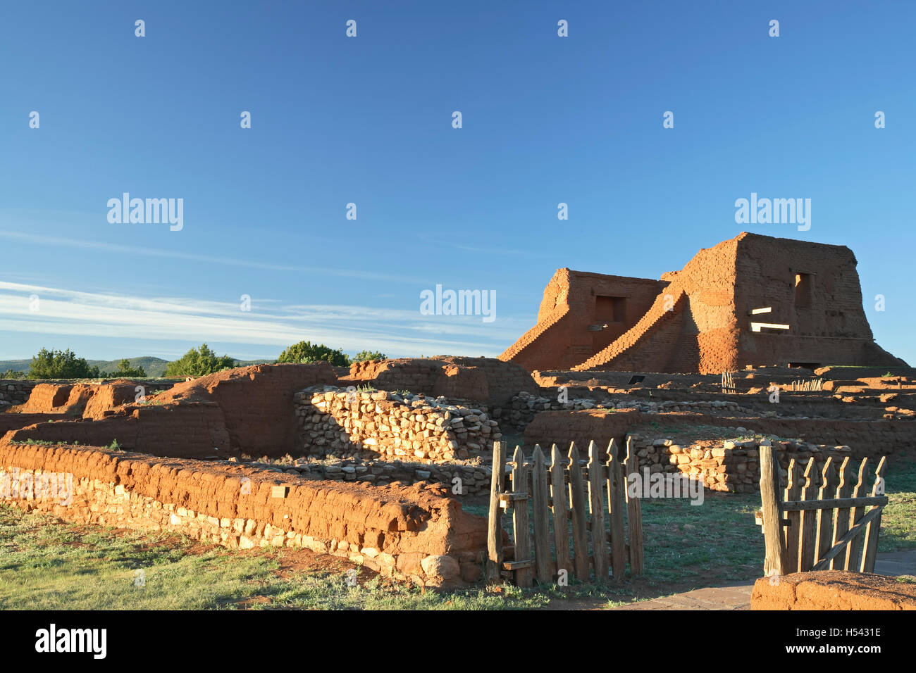 Wooden gate and mission church ruins, Pecos National Historical Park ...