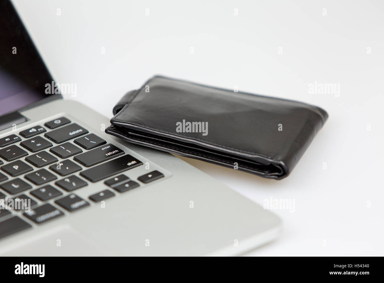 Laptop cash smart phone hi-res stock photography and images - Alamy