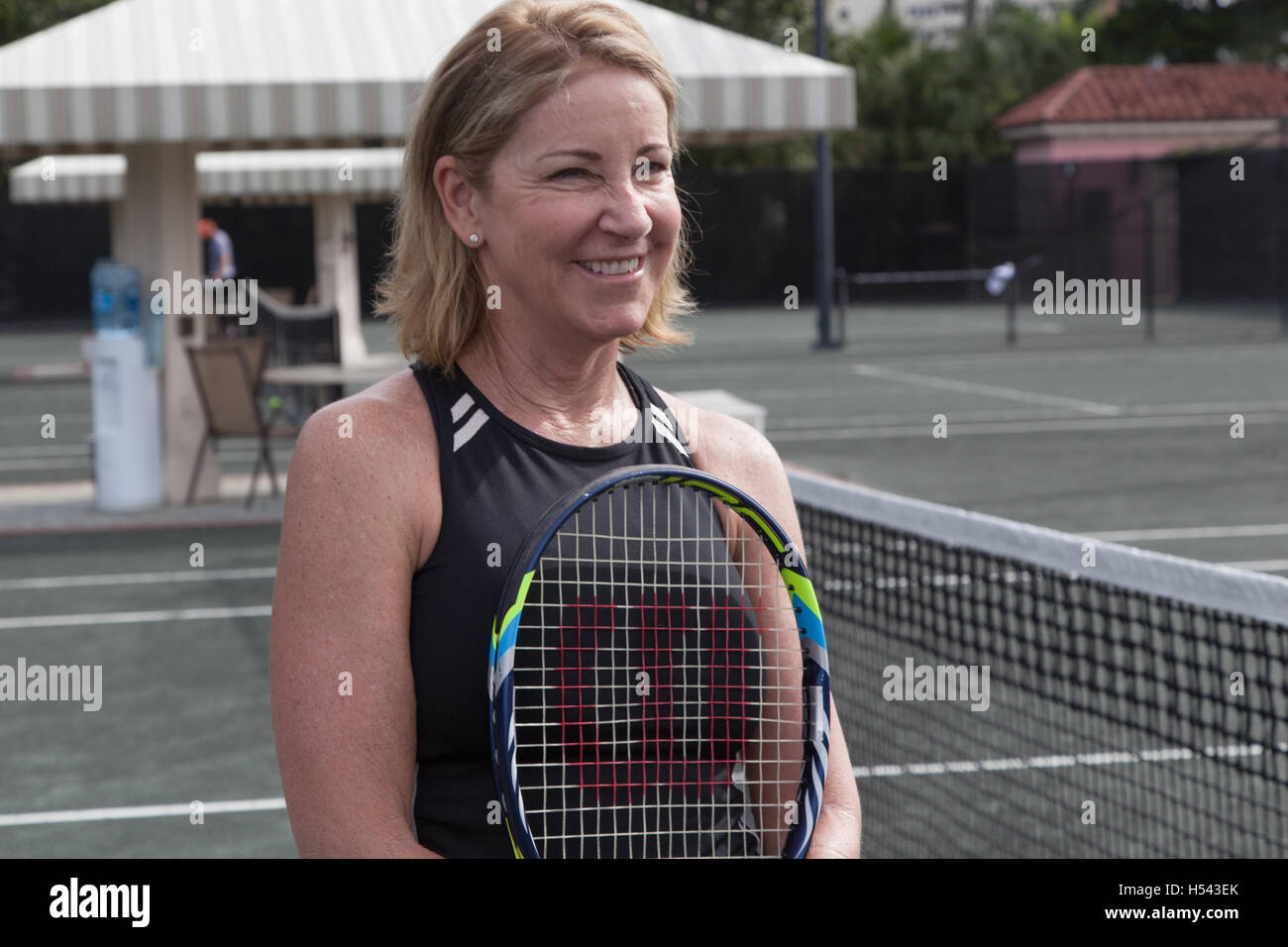 Chris Evert posing for photos at the Chris Evert Pro-Am Celebrity ...