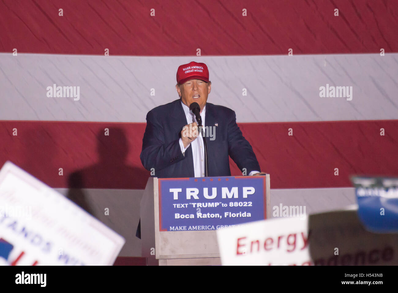 Donald J Trump speaking to a crowd of supporters at his campaign rally ...
