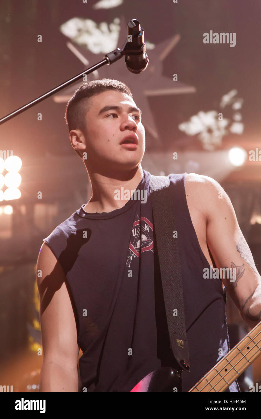 Calum Hood of 5 Seconds of Summer performing at the Y100 iHeart Radio ...