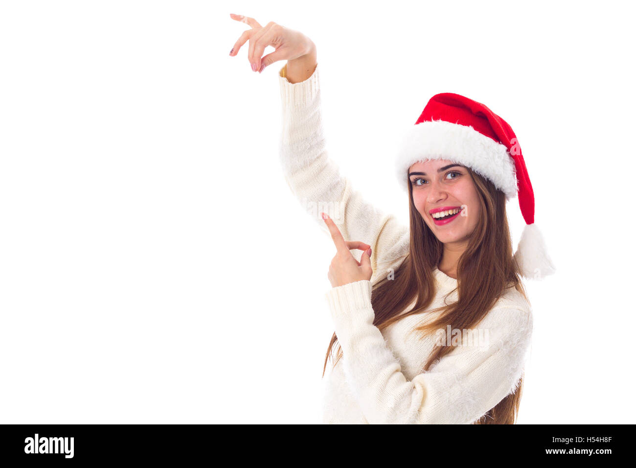 Woman in red christmas hat Stock Photo - Alamy