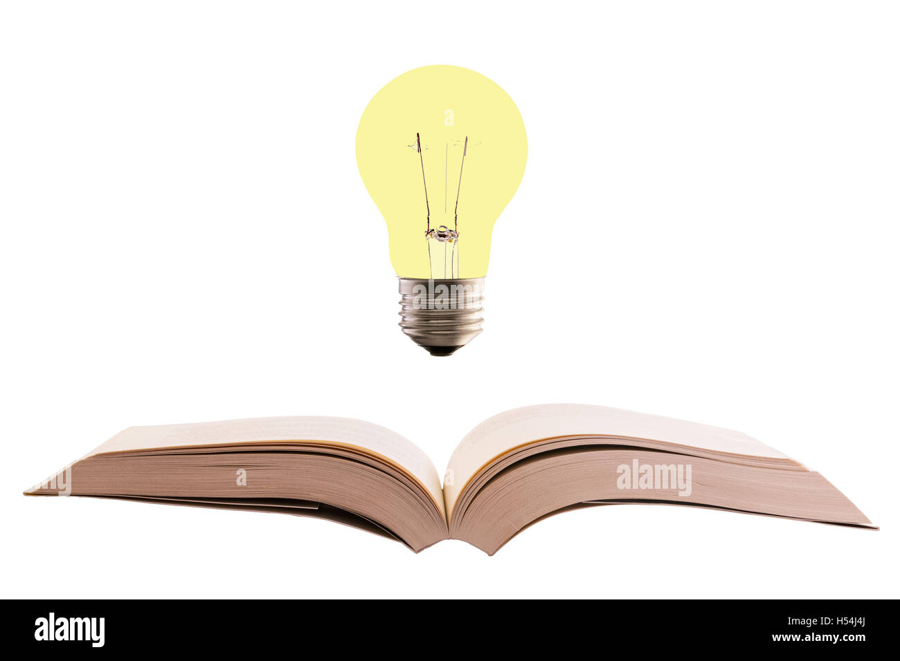open book with lamp bulb floating over it against white background ...