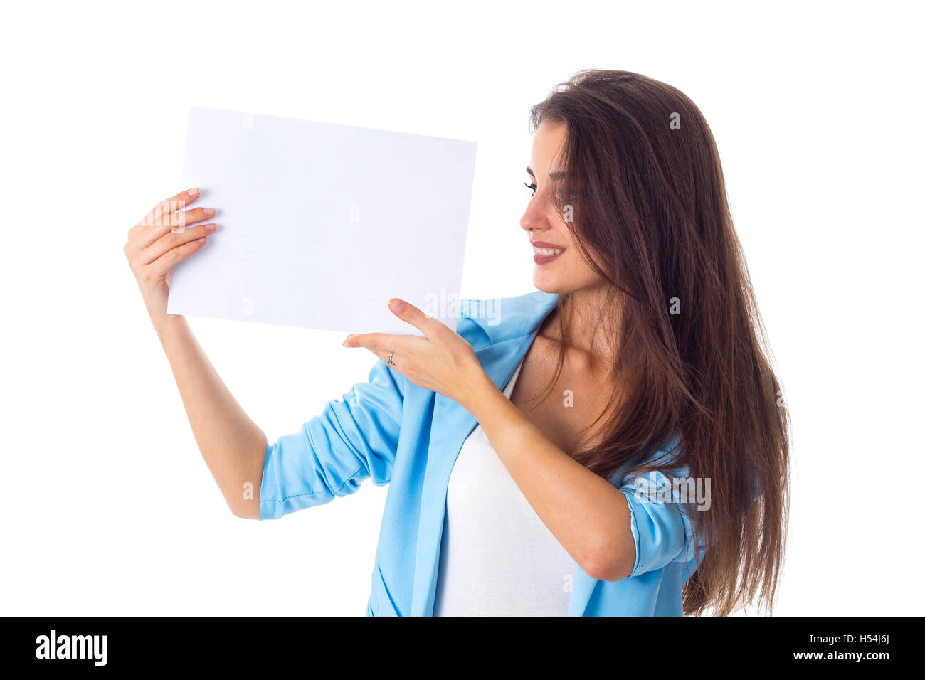 Woman holding white sheet of paper Stock Photo - Alamy
