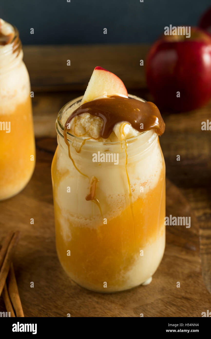 Cold Apple Cider Ice Cream Float with Caramel Sauce Stock Photo - Alamy