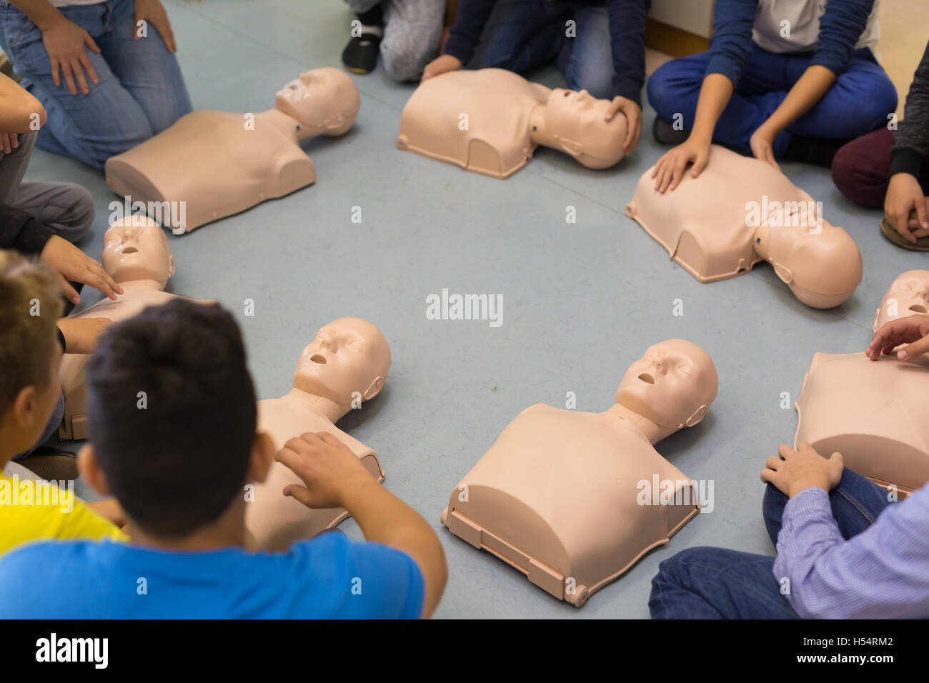 First aid resuscitation course in primary school Stock Photo - Alamy