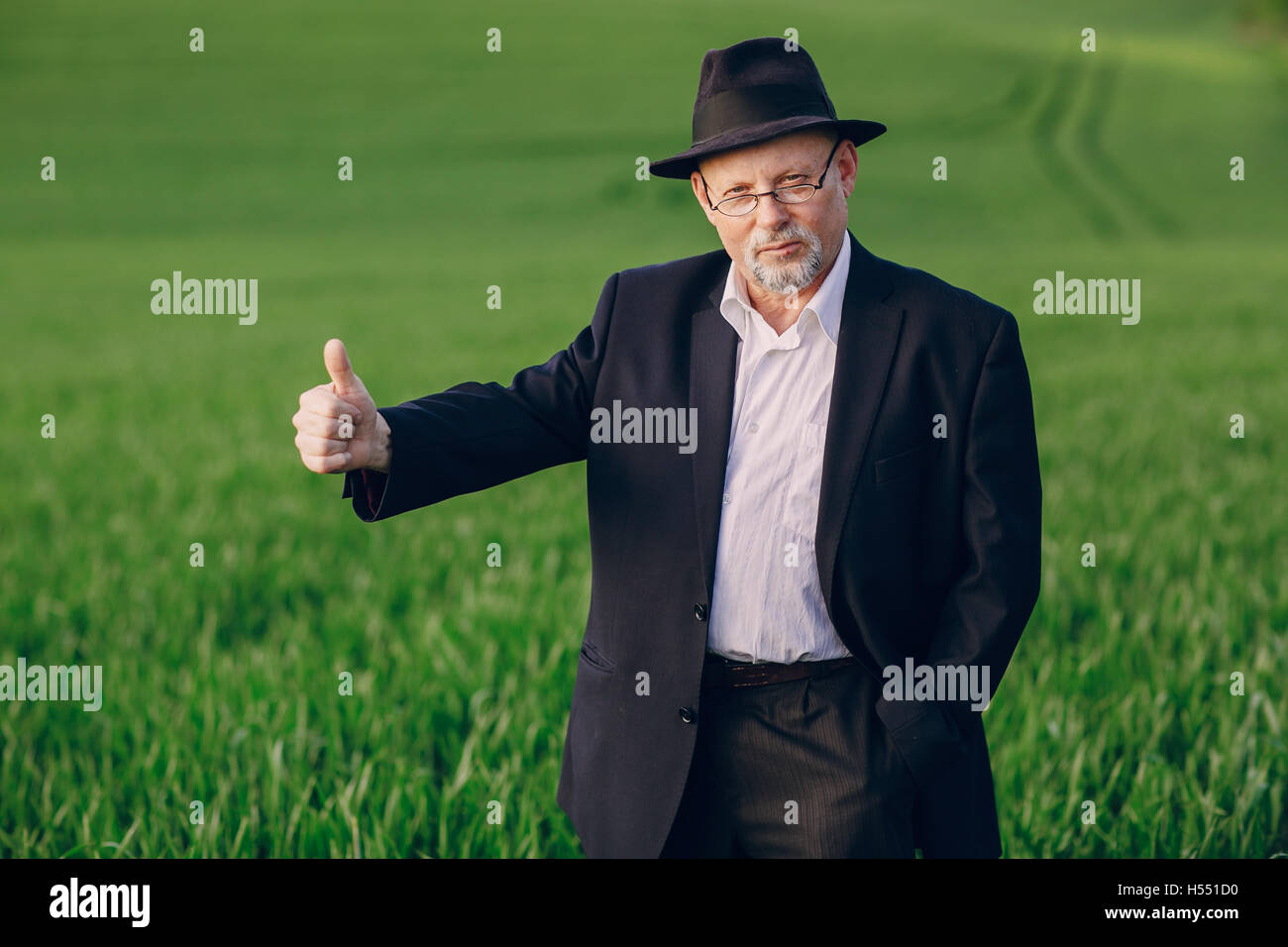 old man in field Stock Photo - Alamy