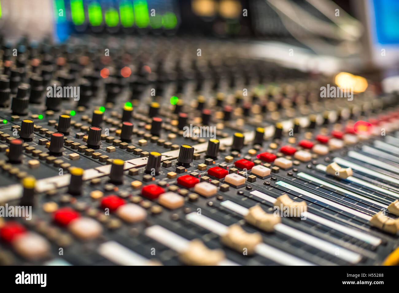 Mixer in the recording studio with various colored buttons Stock Photo ...