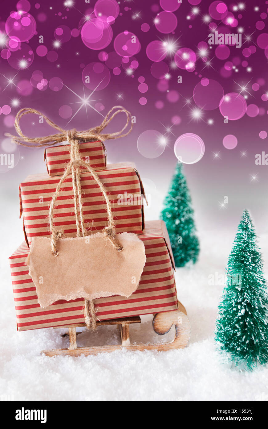 Christmas Sled On Snow With Vertical Purple Background, Copy Space ...