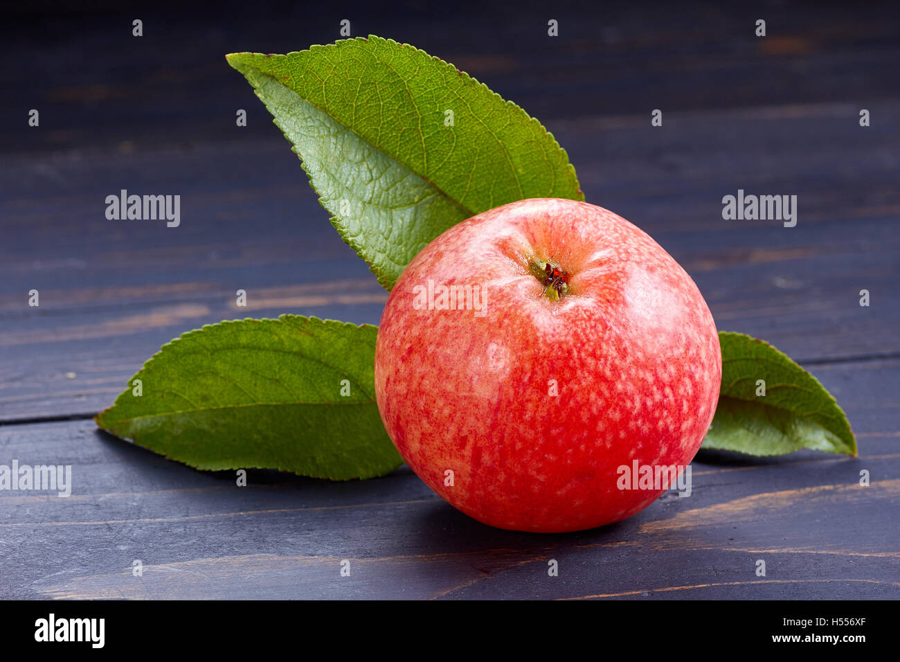 Apple with leaves hi-res stock photography and images - Alamy