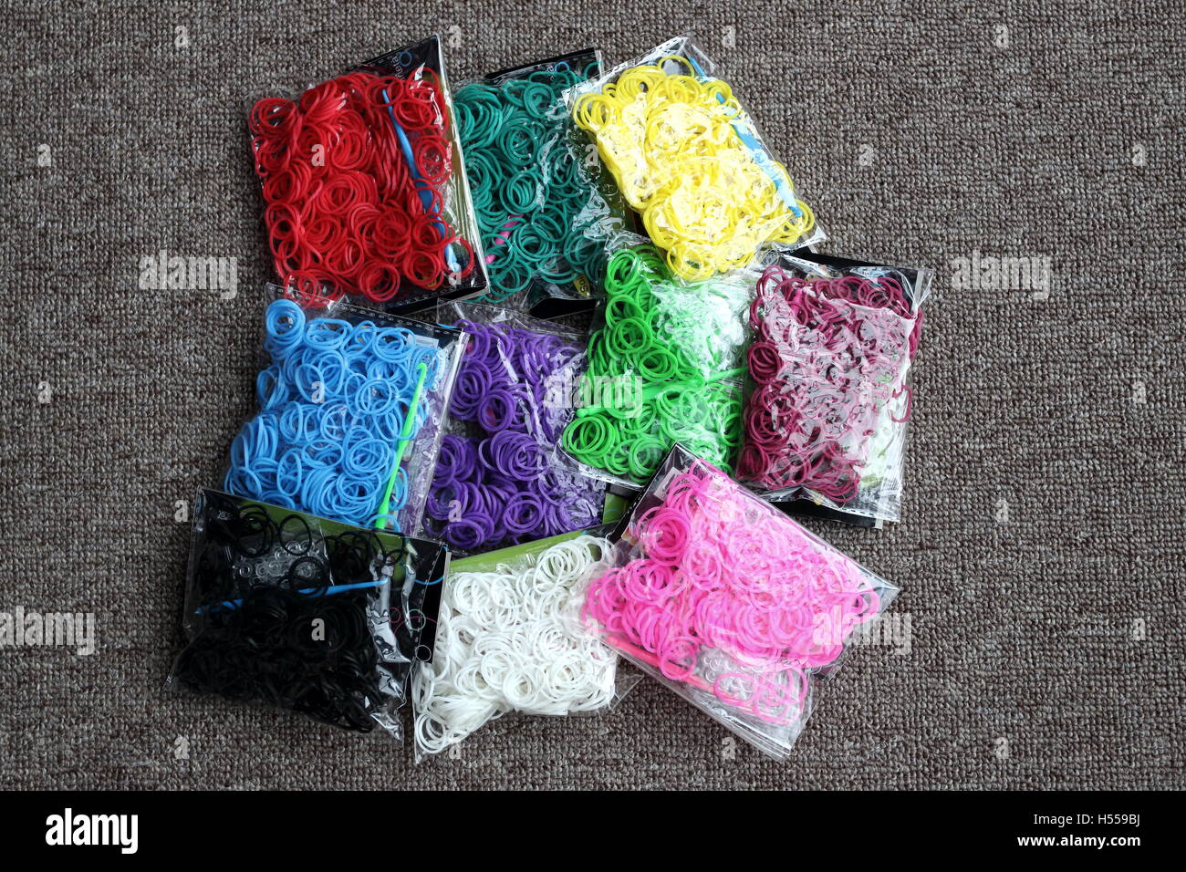 Colorful rubber loom bands Stock Photo - Alamy