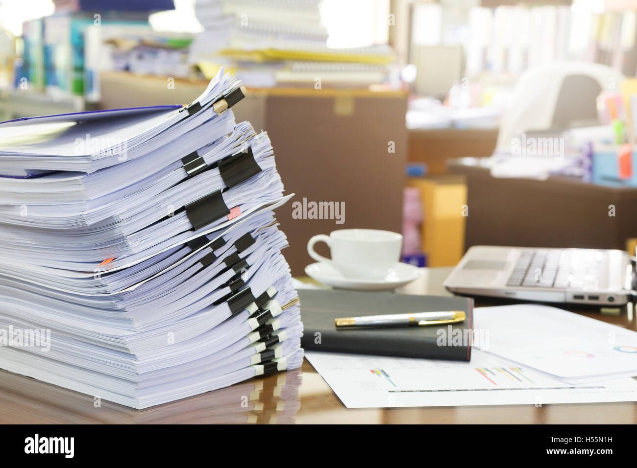 Business Concept, Pile of unfinished documents on office desk, Stack of ...