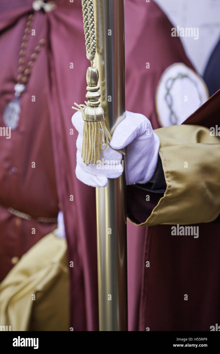 Cane Golden Easter, detail of a person dressed as a penitent in a ...