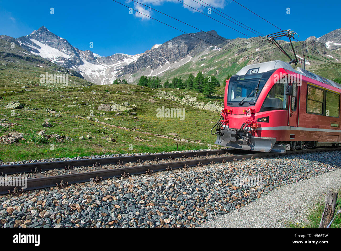 Red train to the Alps Stock Photo - Alamy