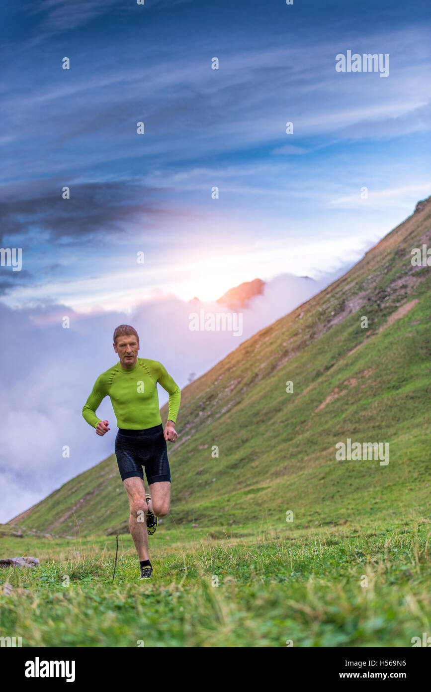 Running in mountain Stock Photo - Alamy