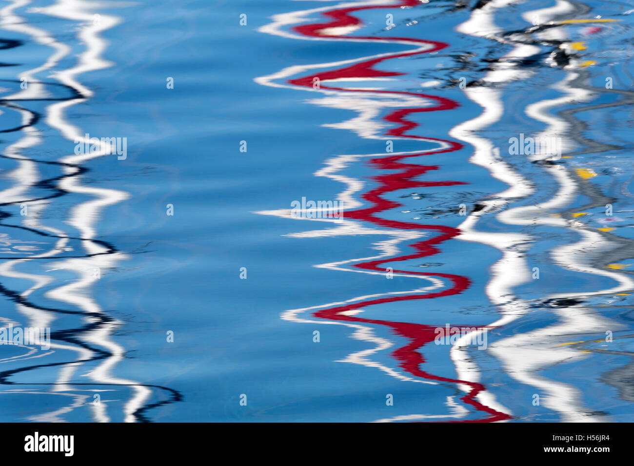Colored reflections on the water Stock Photo - Alamy
