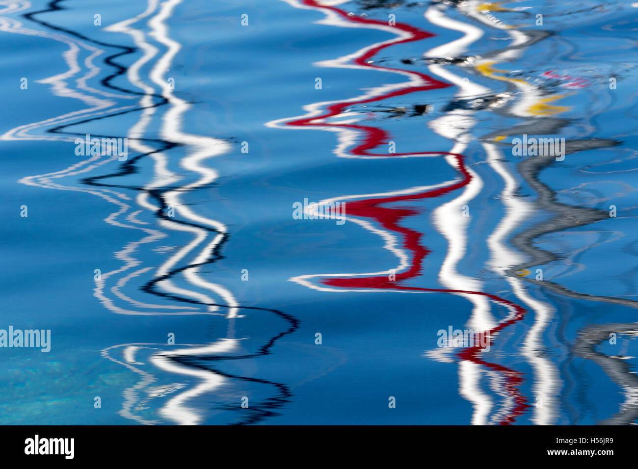 Colored reflections on the water Stock Photo - Alamy