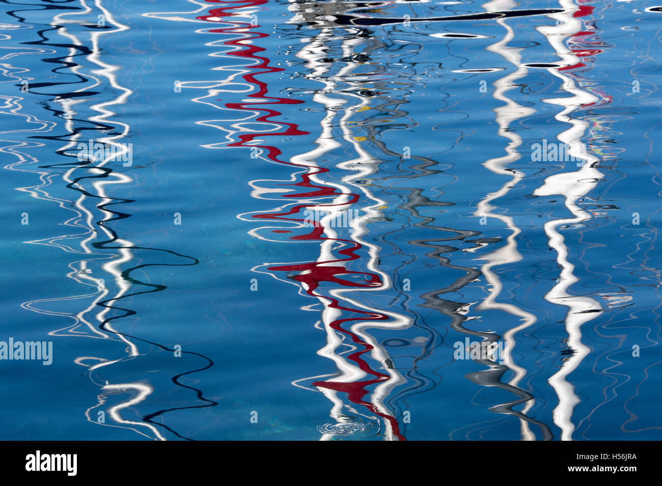 Colored reflections on the water Stock Photo - Alamy