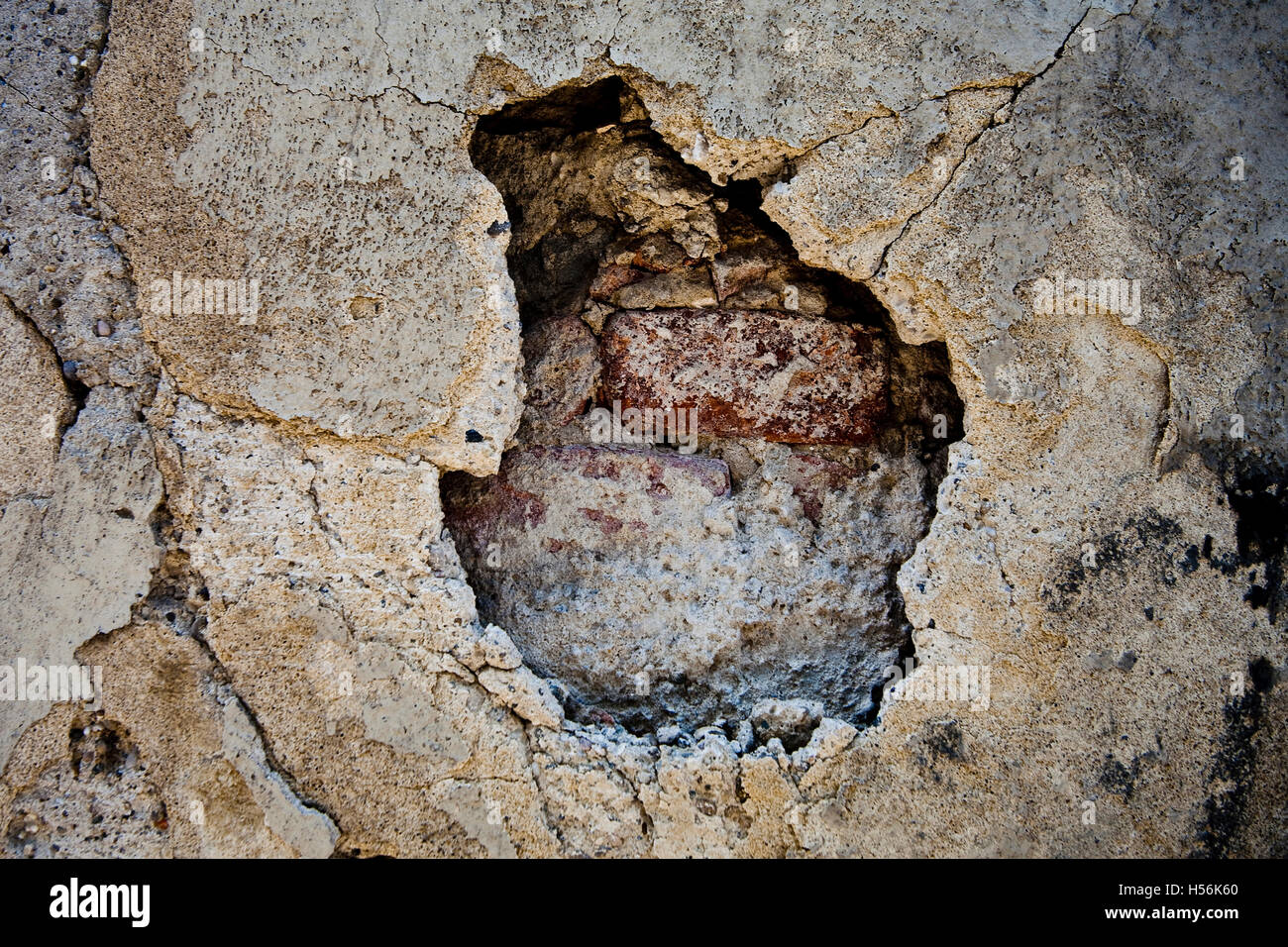 Hole in a wall Stock Photo - Alamy