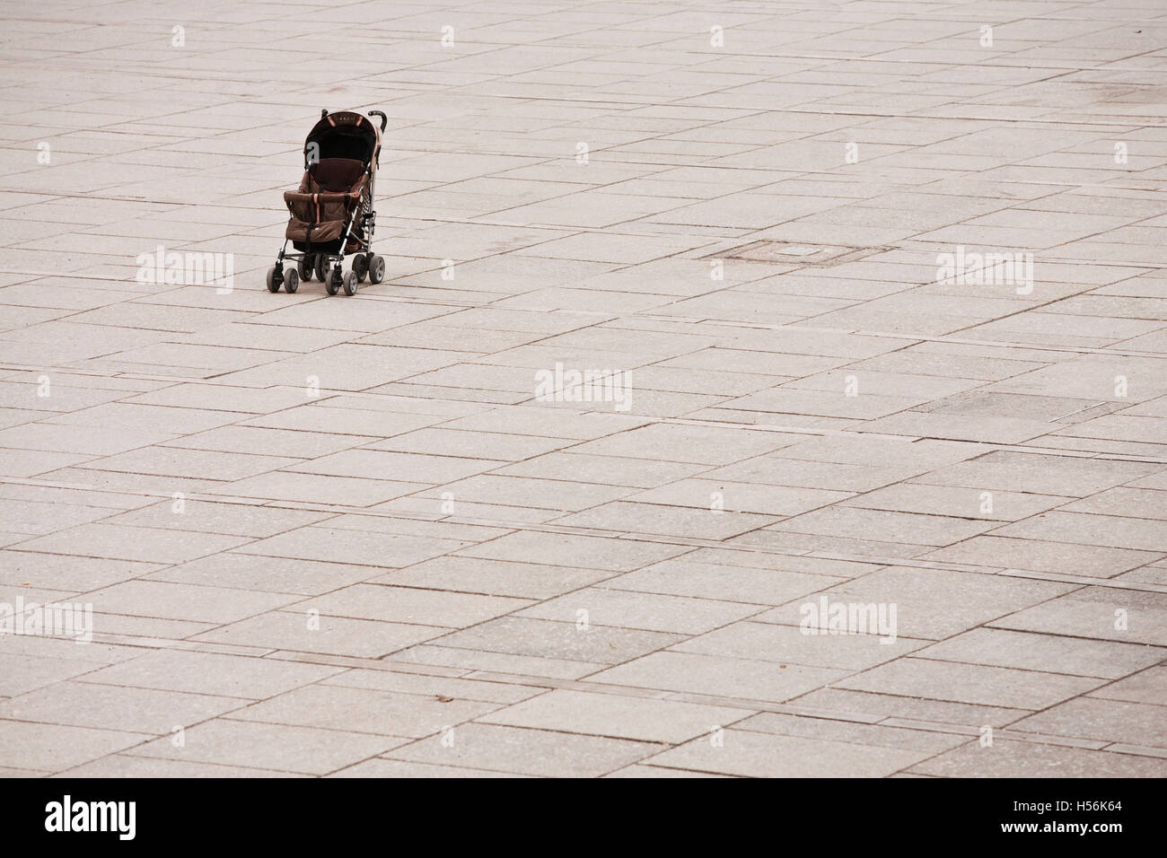Empty buggy on a square Stock Photo - Alamy
