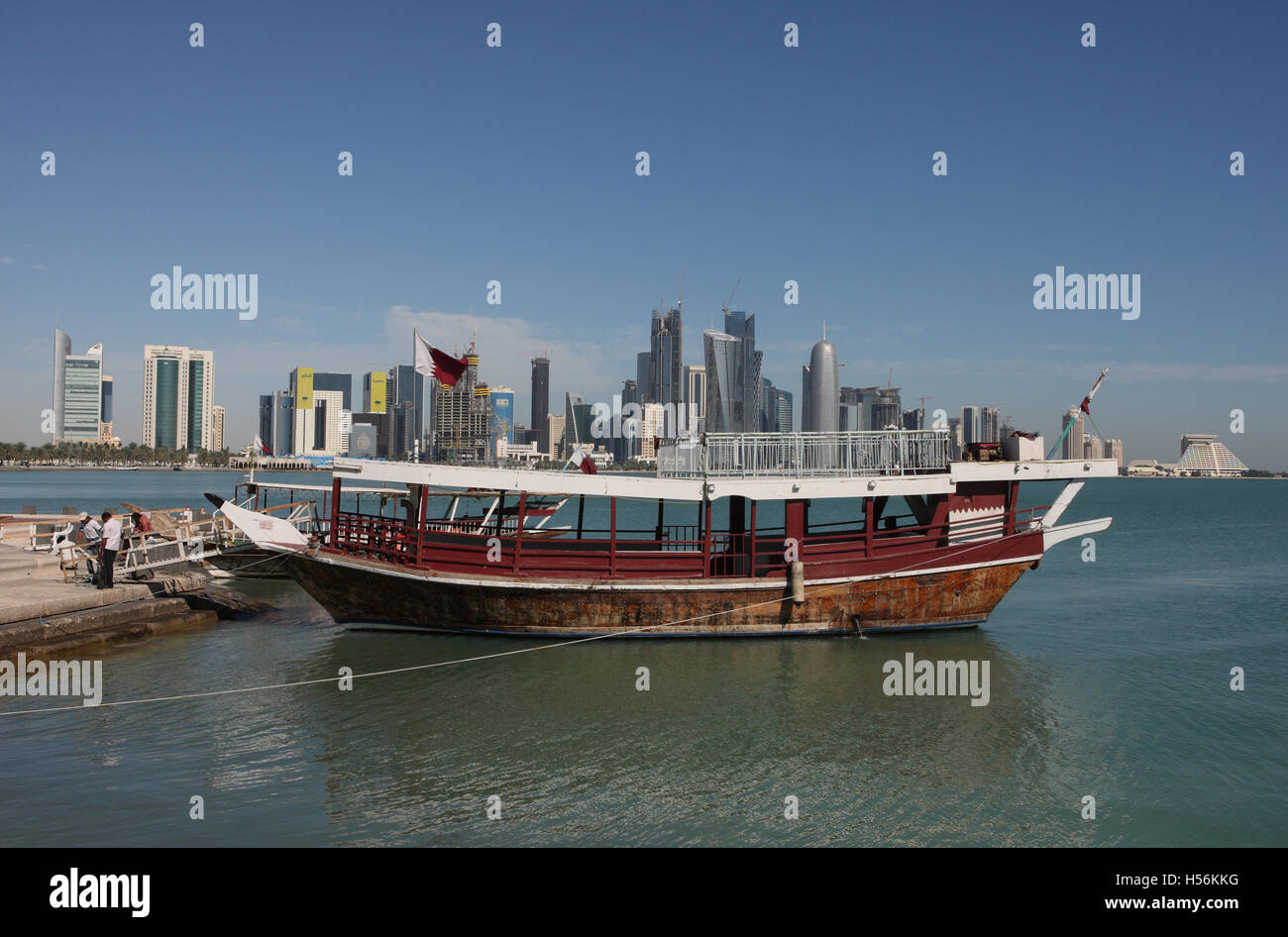 Excursion boat in front of skyline, West Bay District, Doha, Qatar ...