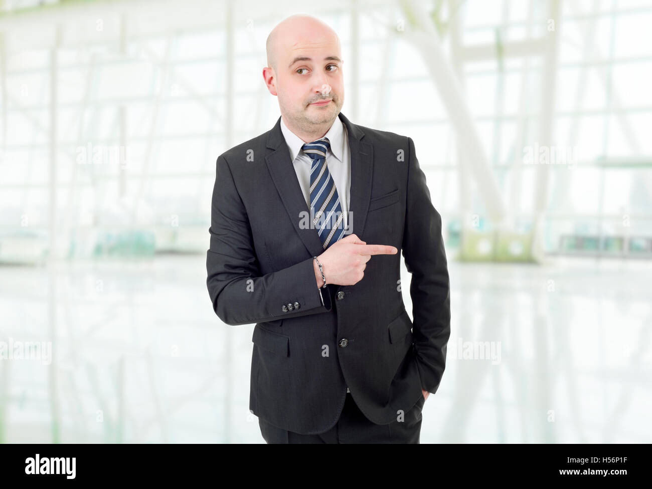 young business man pointing, at the office Stock Photo - Alamy