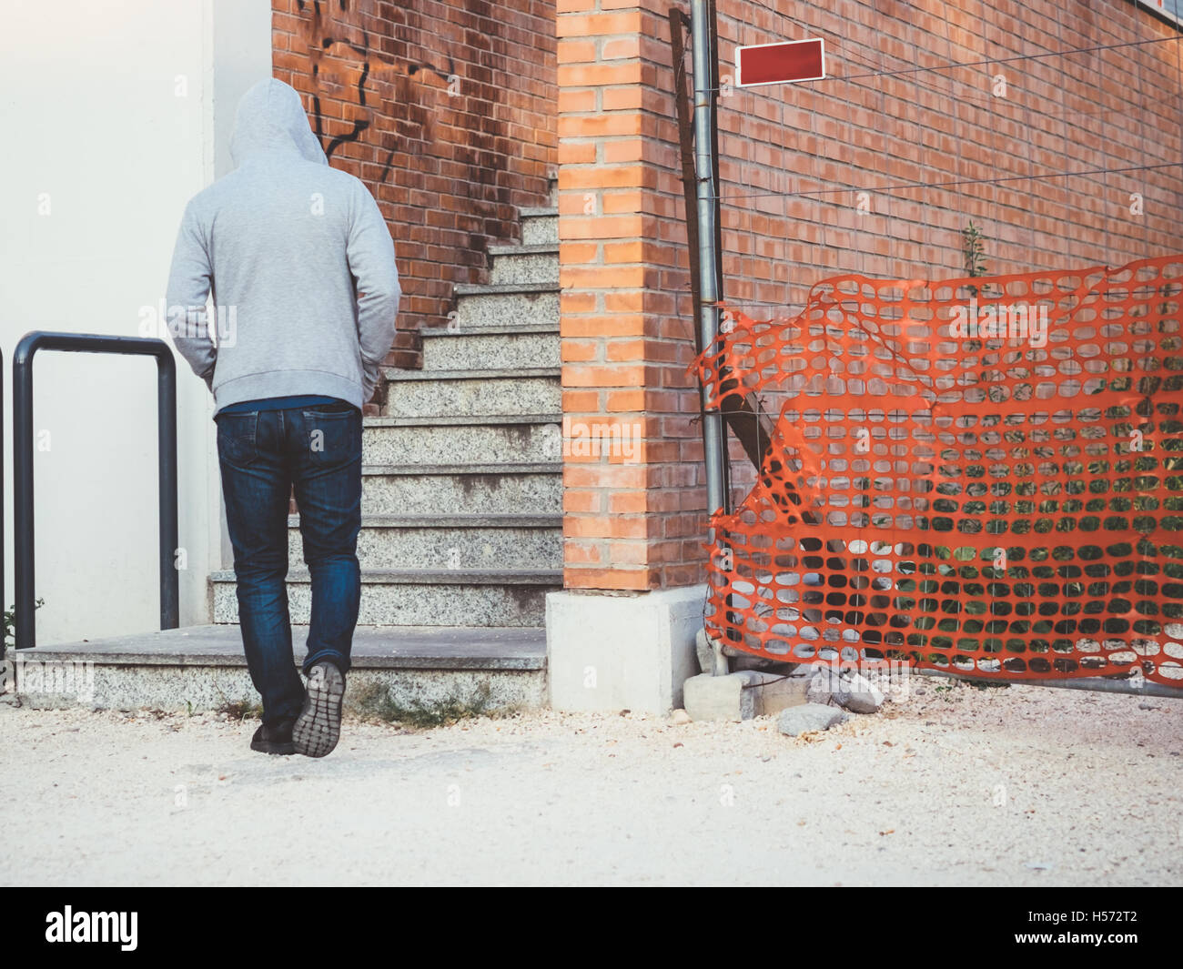 Teen walking into house hi-res stock photography and images - Alamy