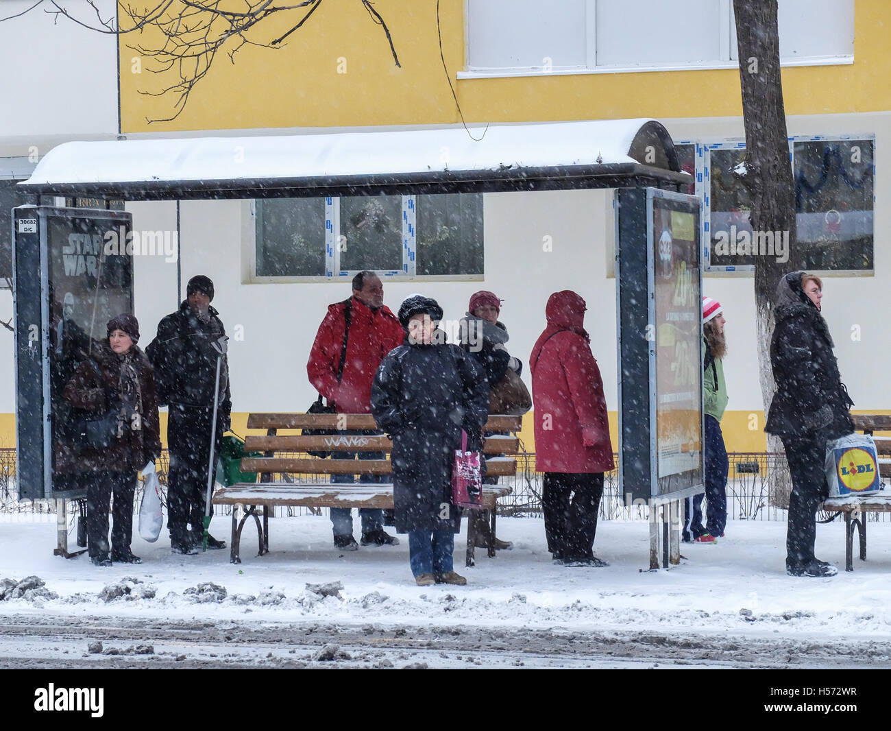 Bucharest, Romania, 4 January 2016: People are waiting for their route ...