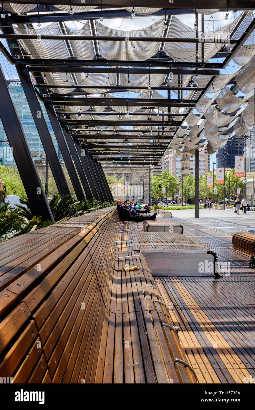 A shaded seating area in Victoria Square in the centre of Adelaide ...